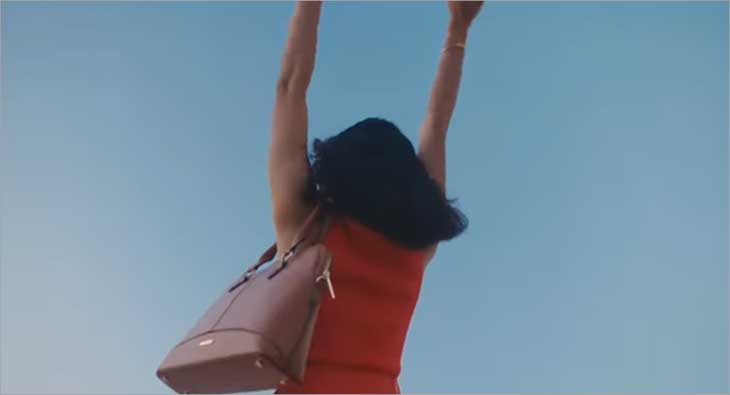 Titan's ad for IRTH totes promises of versatility and style